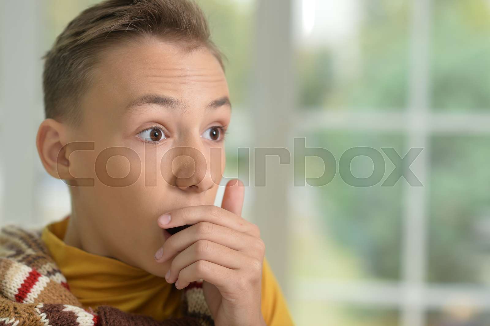 Shocked teen boy | Stock image | Colourbox