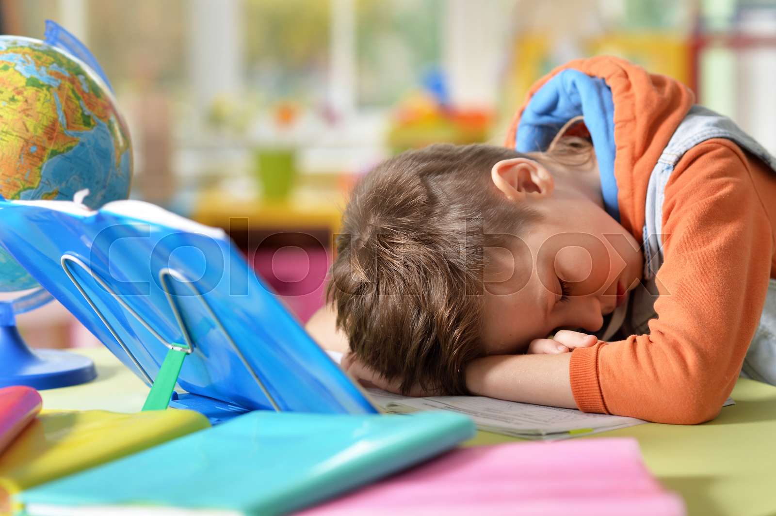 Tired little boy | Stock image | Colourbox