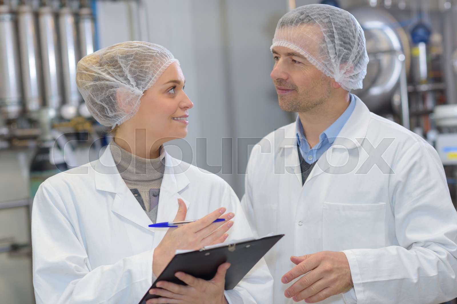 workers doing a quality control test | Stock image | Colourbox