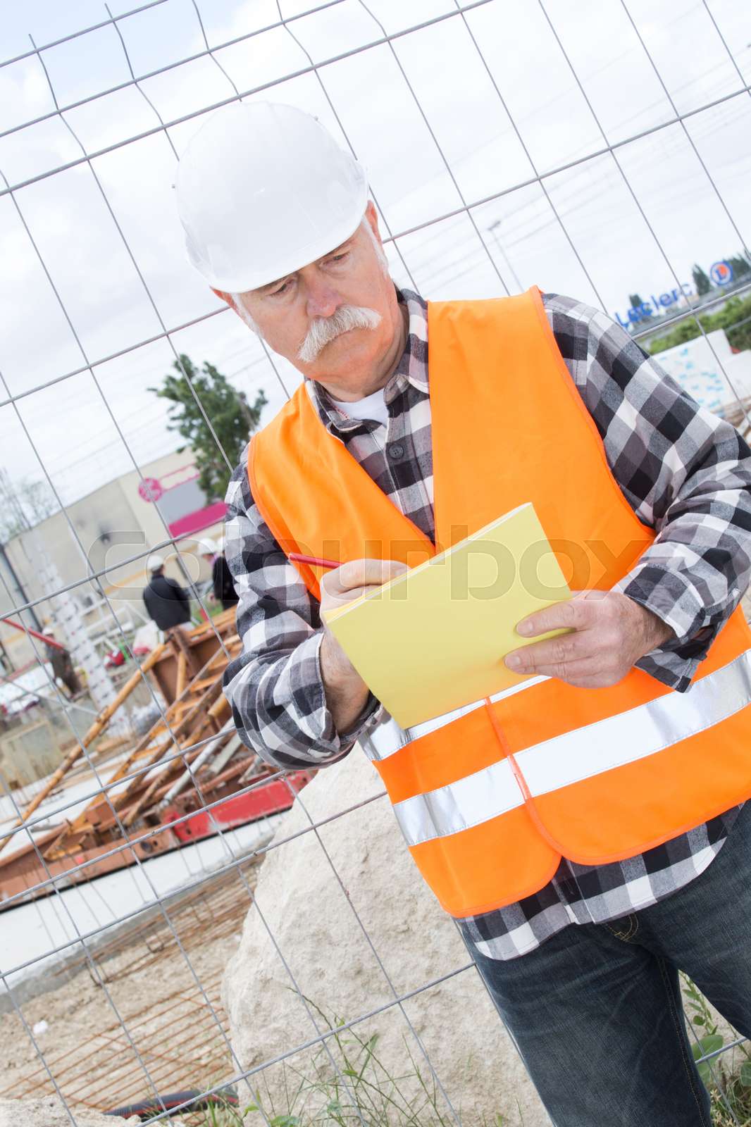construction manager standing on building site | Stock image | Colourbox