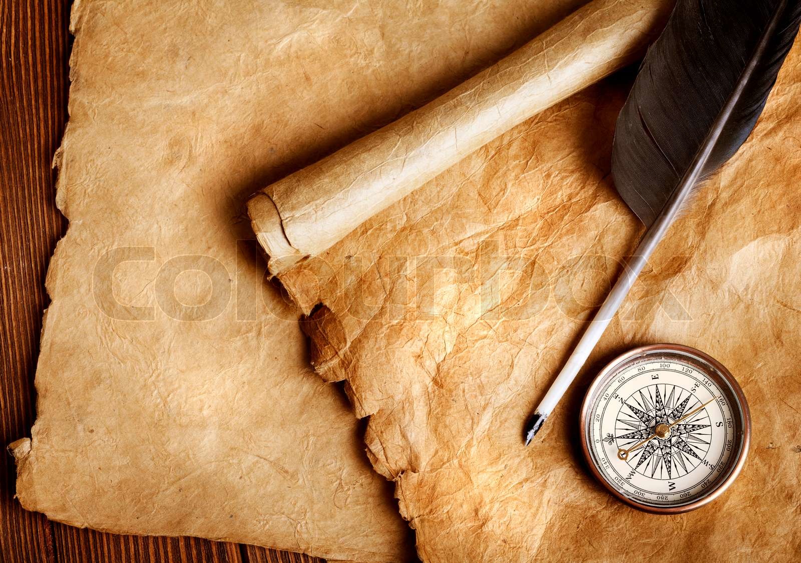Compass on old parchment | Stock image | Colourbox