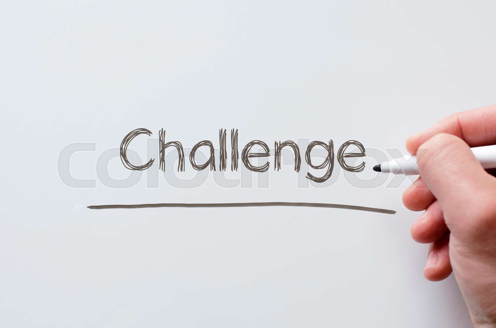 Challenge written on whiteboard | Stock image | Colourbox