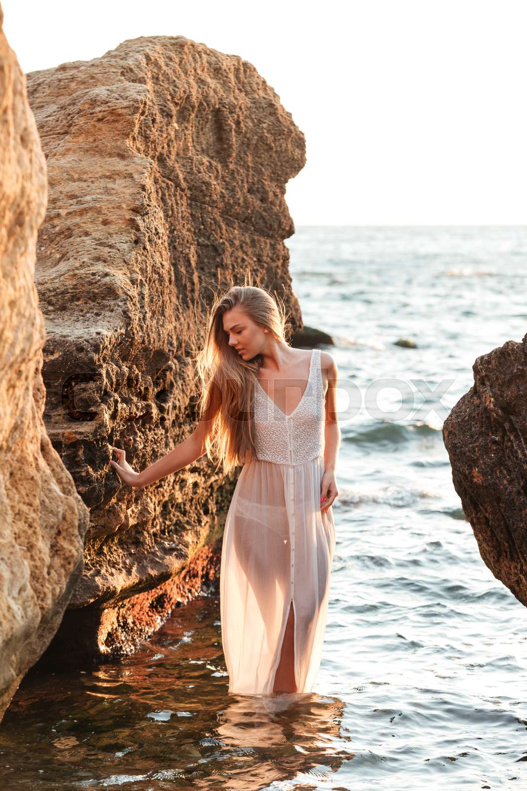 Beautiful model in water | Stock image | Colourbox