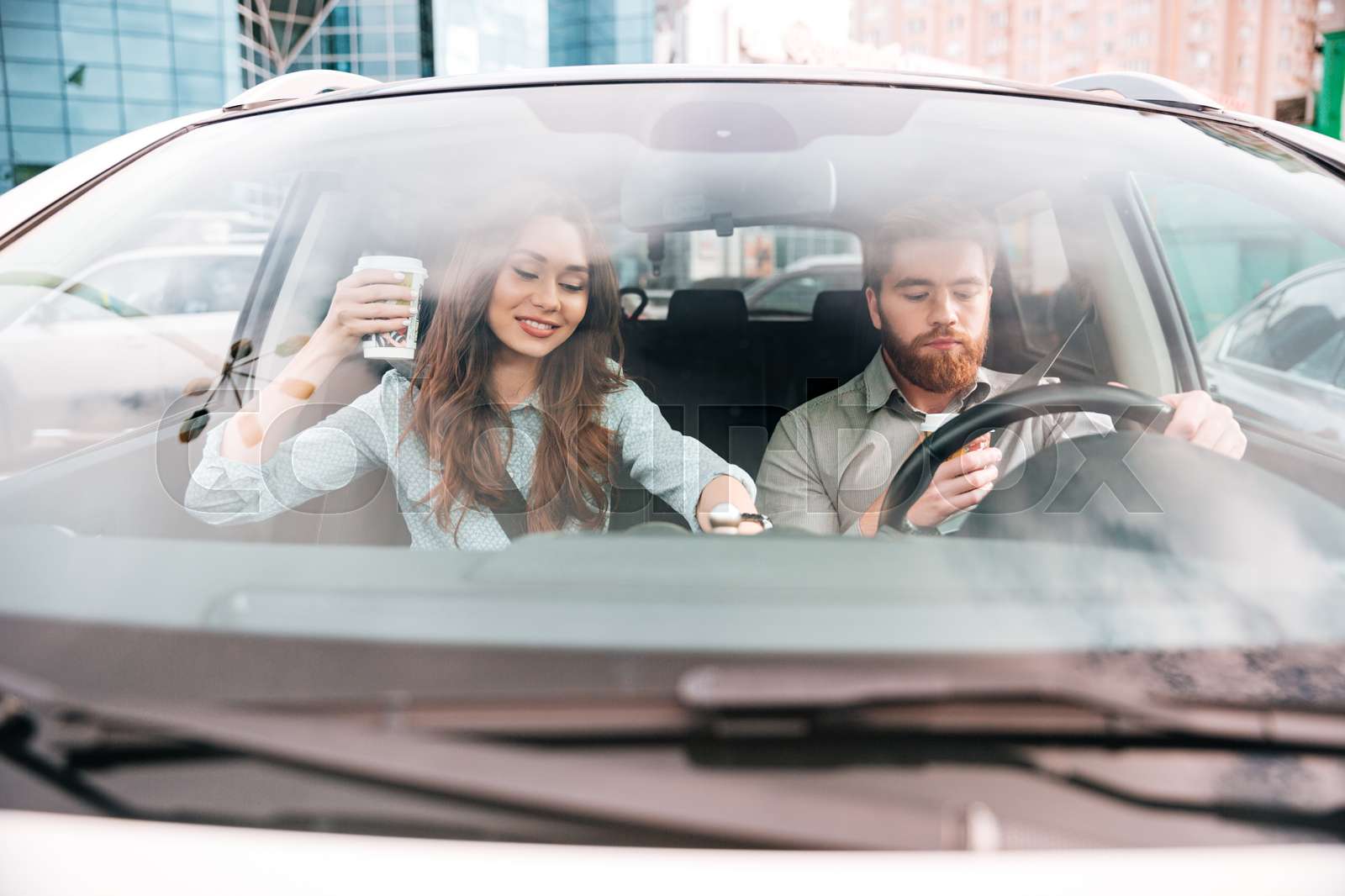 Fun couple in car | Stock image | Colourbox