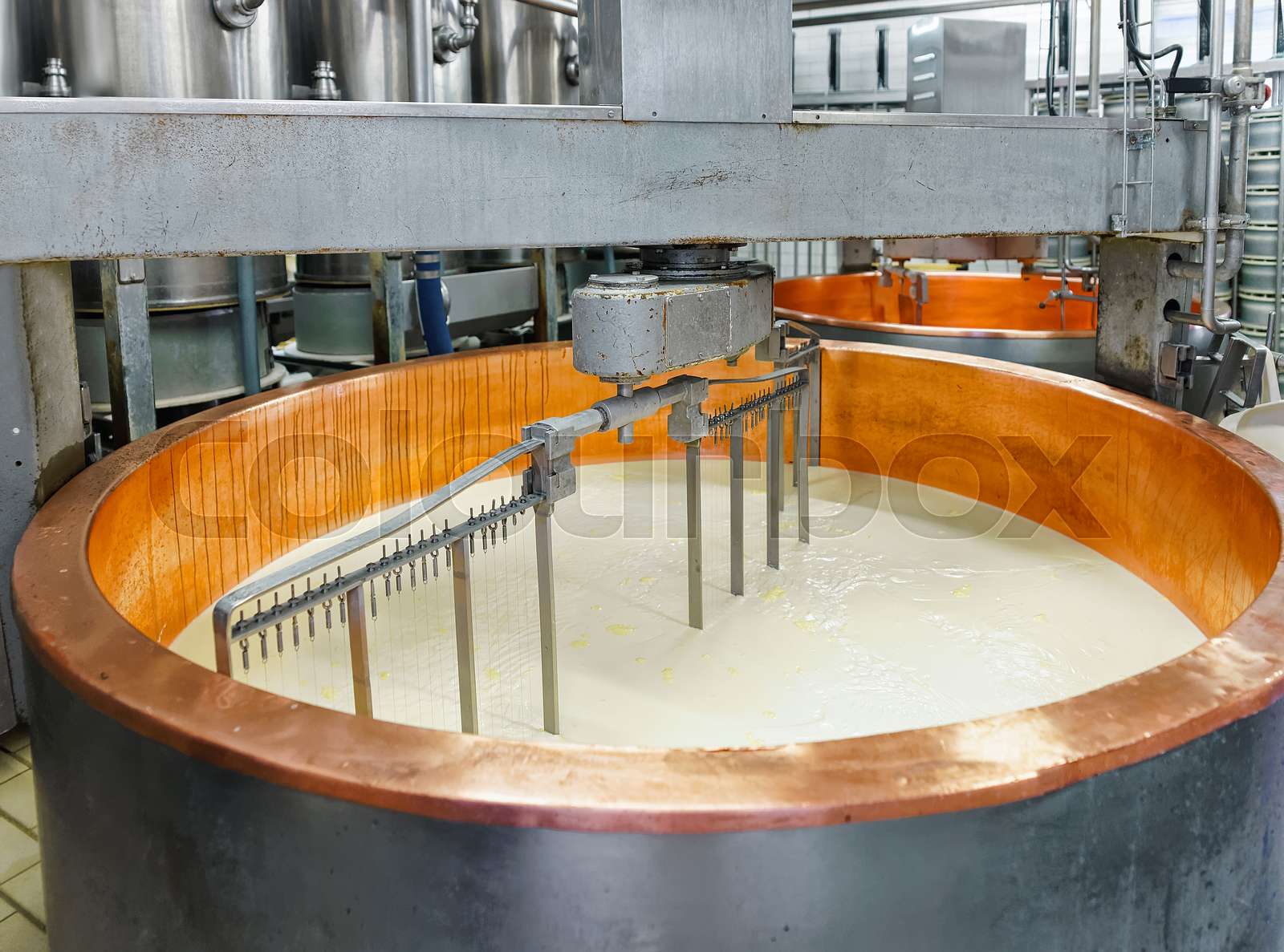 Production of Gruyere de Comte Cheese in dairy of France | Stock image ...