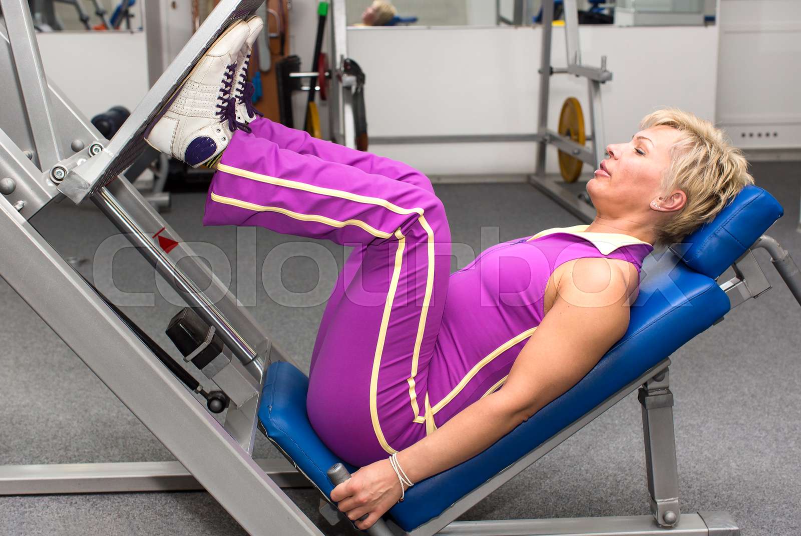 Adult female bodybuilding competitions in the gym | Stock image | Colourbox
