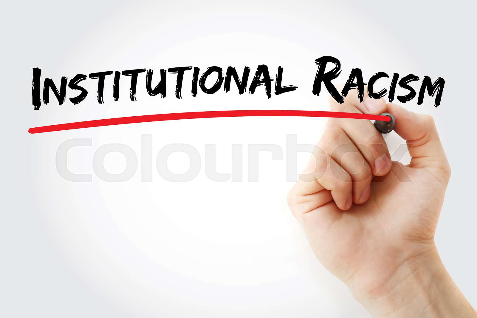 Hand writing Institutional racism with marker | Stock image | Colourbox