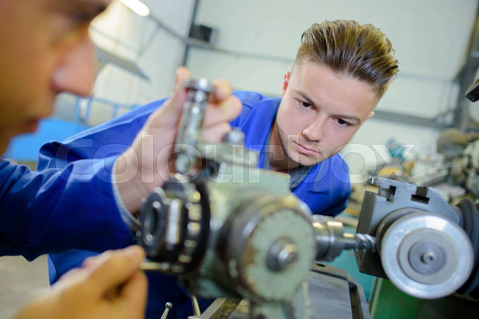 blacksmith with his apprentice | Stock image | Colourbox