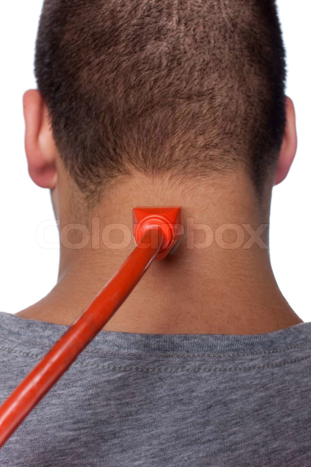 Conceptual image of a young man with an electrical cord plugged into ...