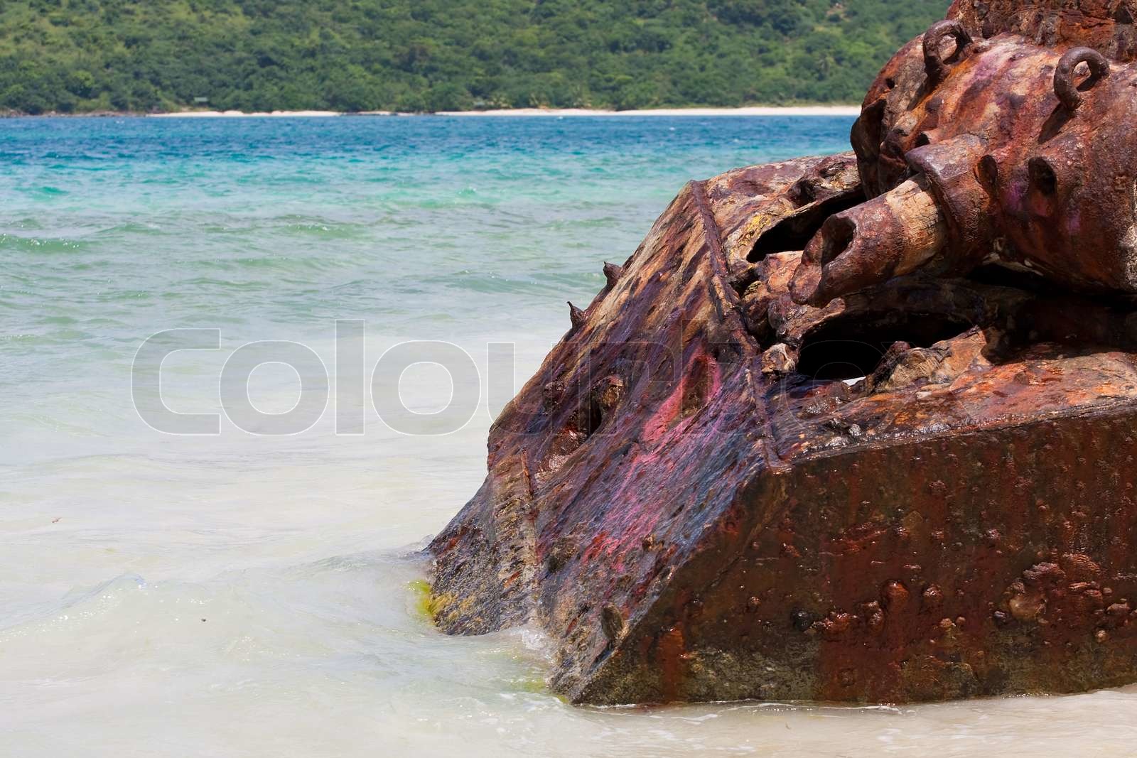 Close up of the old rusted and deserted US Army tank of Flamenco beach ...