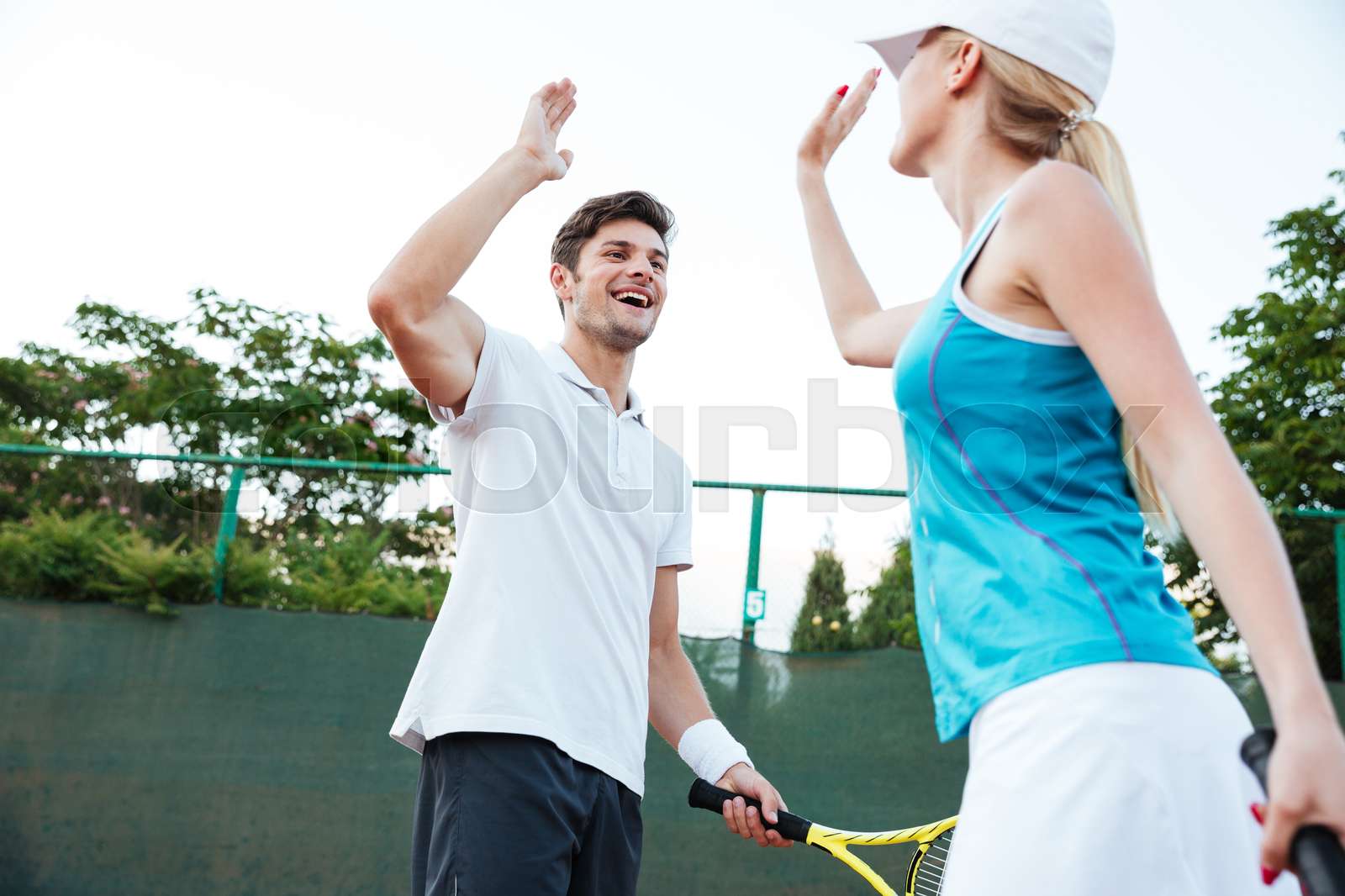 Happy tennis players | Stock image | Colourbox