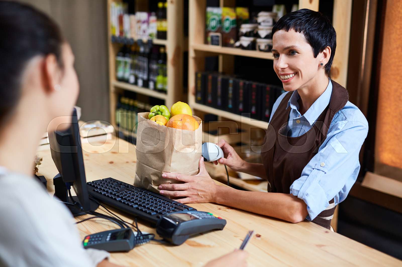 Working in grocery store | Stock image | Colourbox