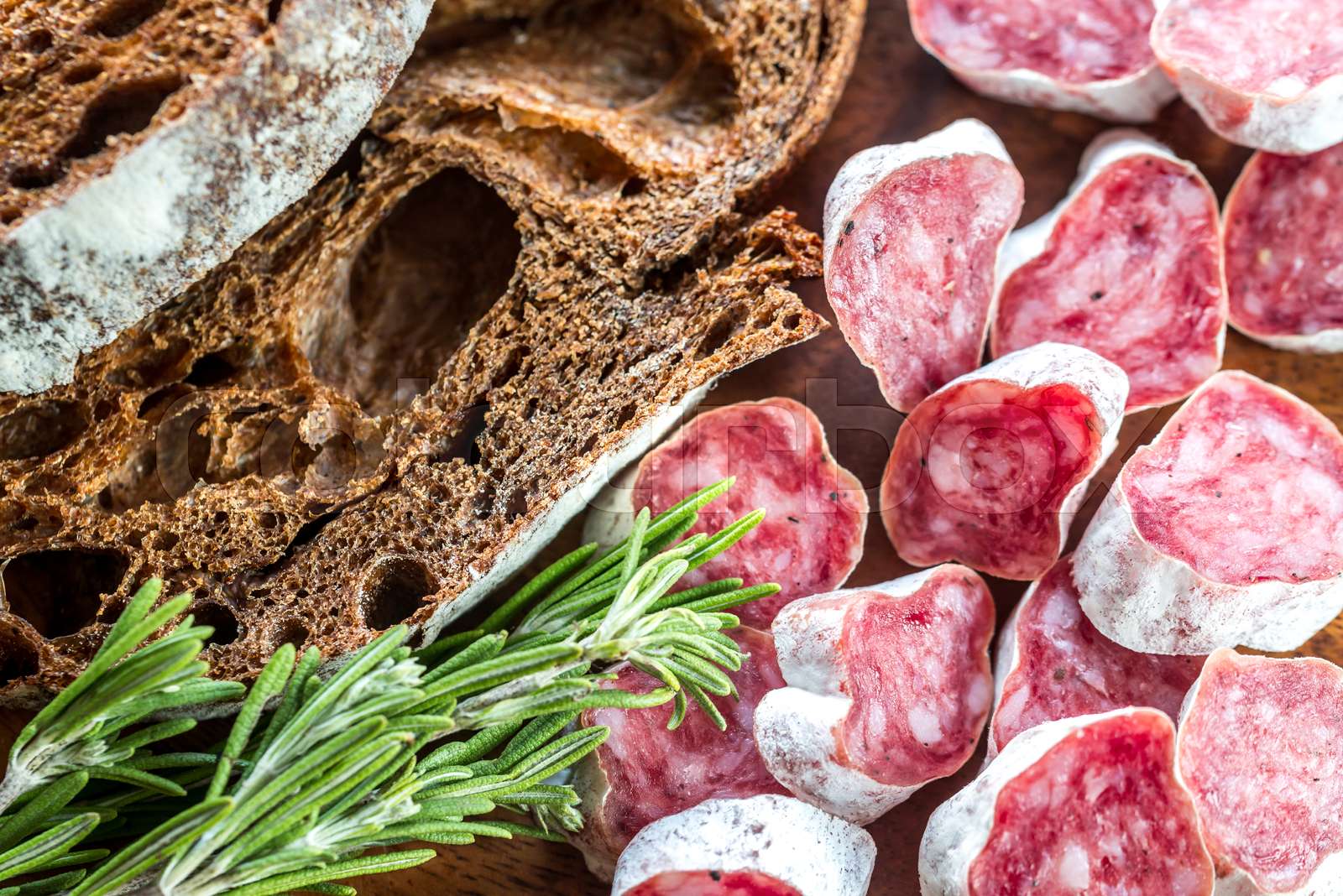 Fuet with dark-rye bread | Stock image | Colourbox