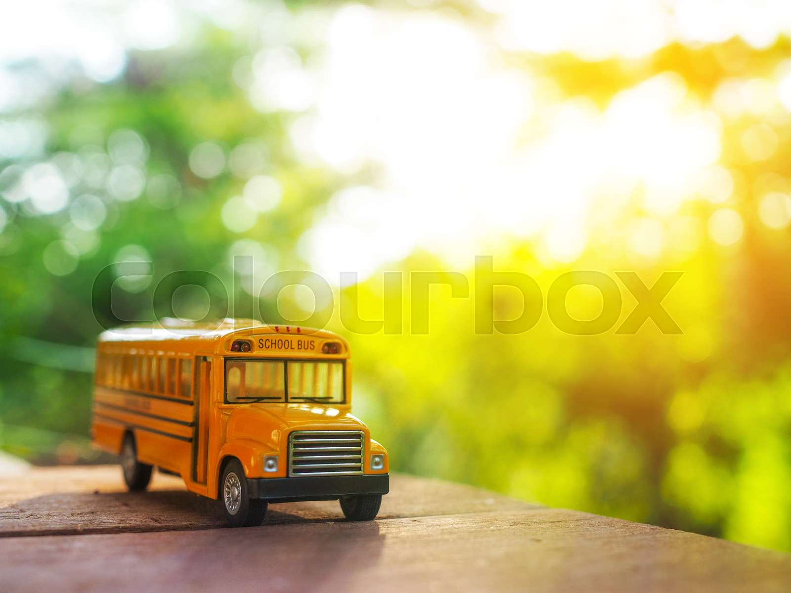 school bus plastic and metal toy model | Stock image | Colourbox