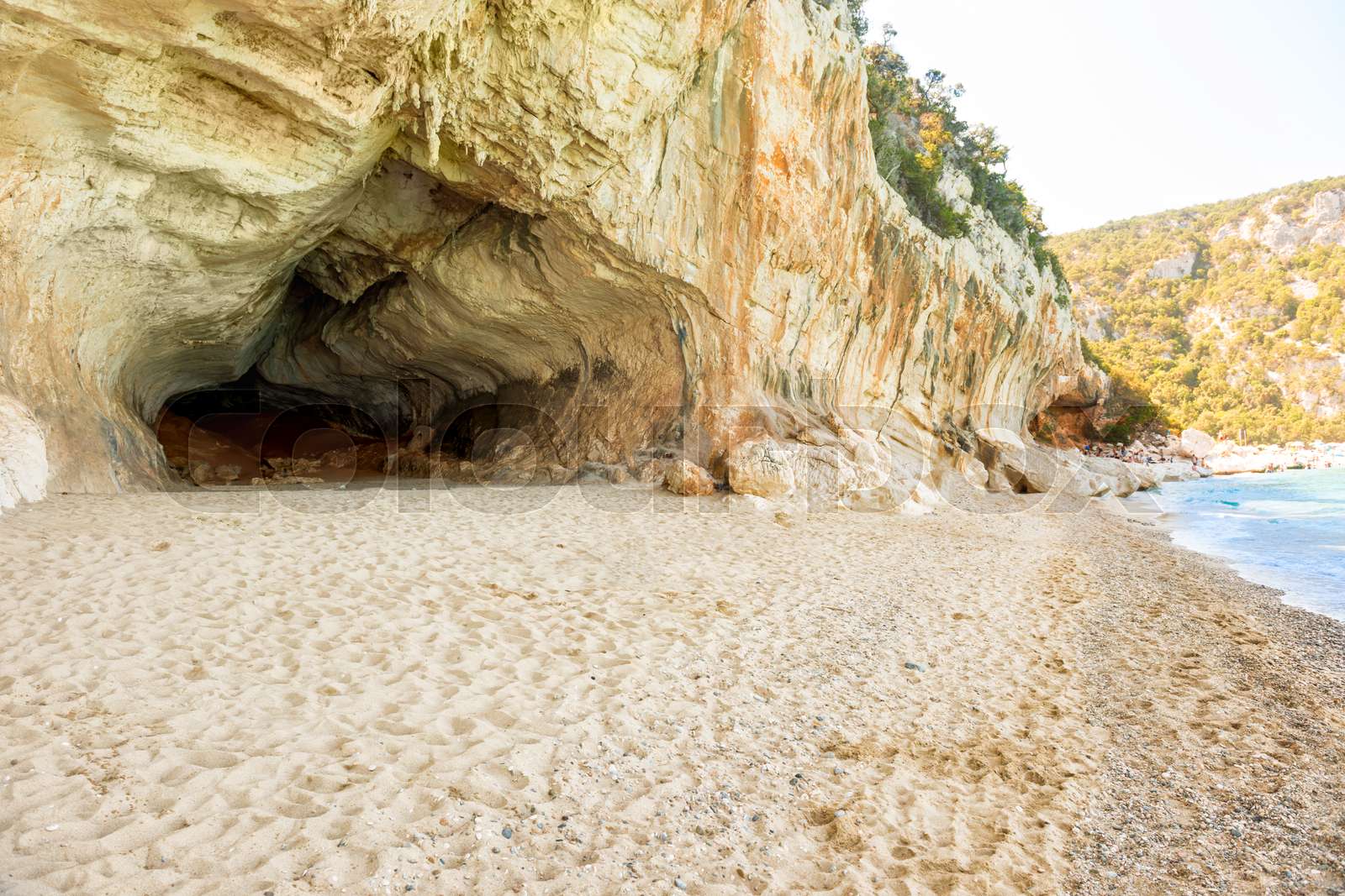 Entrance to big empty cave | Stock image | Colourbox