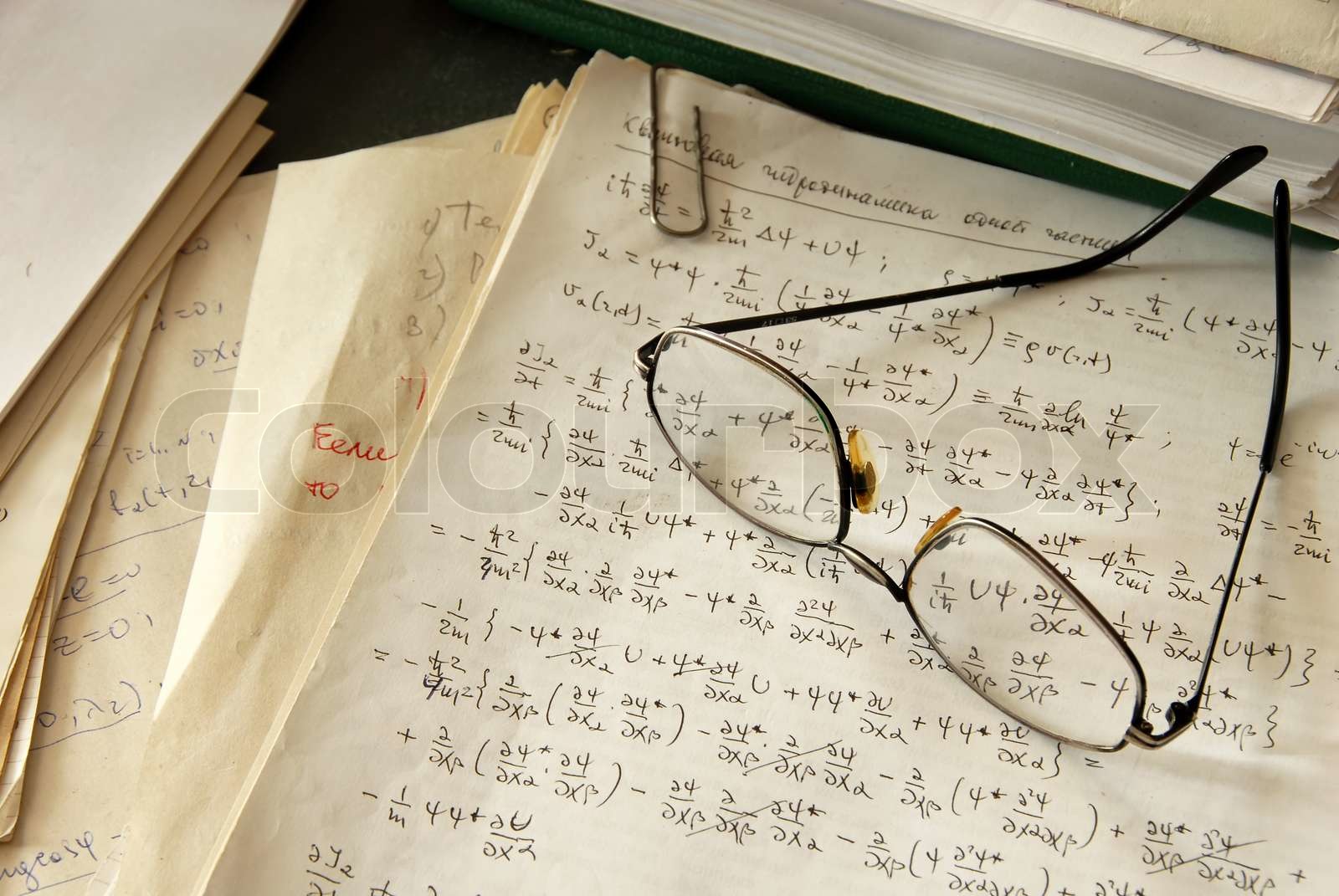 glasses over physics formulas and calculations written on paper | Stock ...