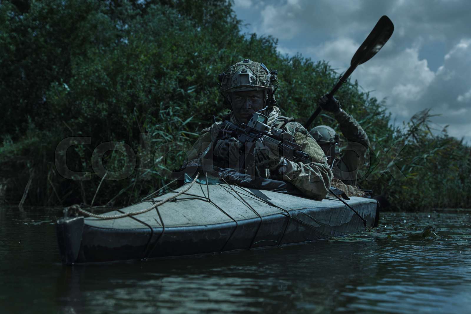 Spec ops in the military kayak | Stock image | Colourbox