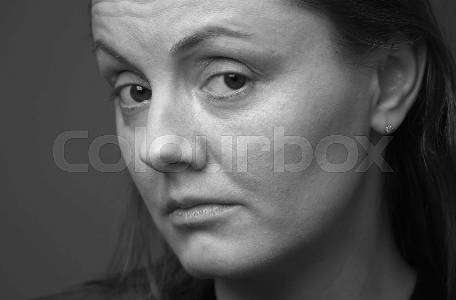 Sad adult woman's face | Stock image | Colourbox