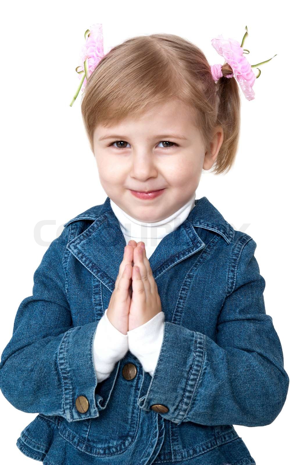 praying little girl. isolated | Stock image | Colourbox