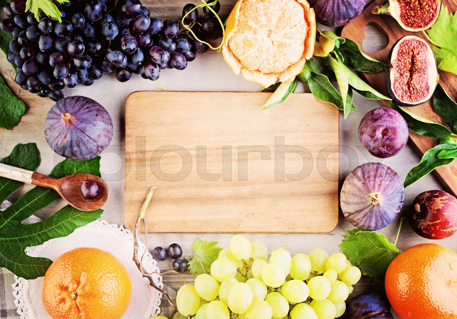Healthy Eating Background with Organic Fruits and Brown Wooden Board ...