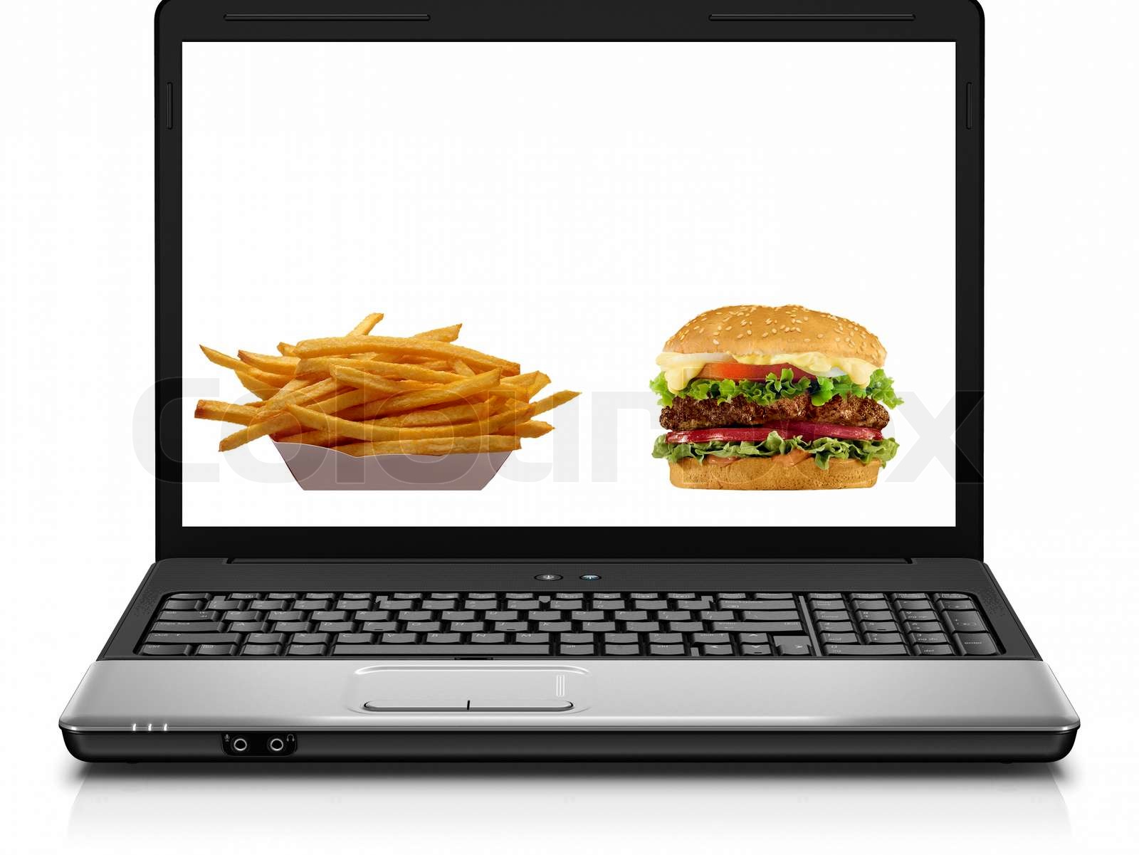 Laptop computer with an hamburger and french fries | Stock image ...