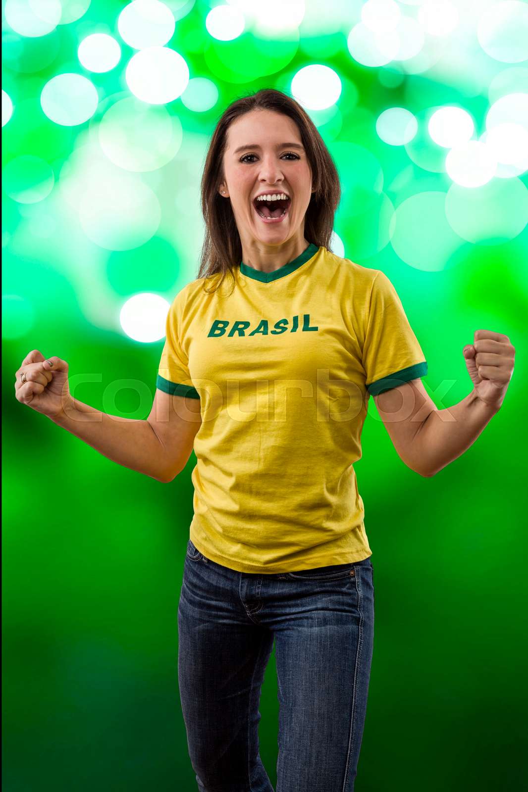 Female Brazilian fan celebrating | Stock image | Colourbox