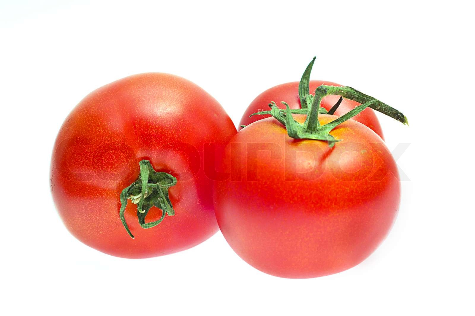 Røde tomater isoleret på hvidt | Stock foto | Colourbox