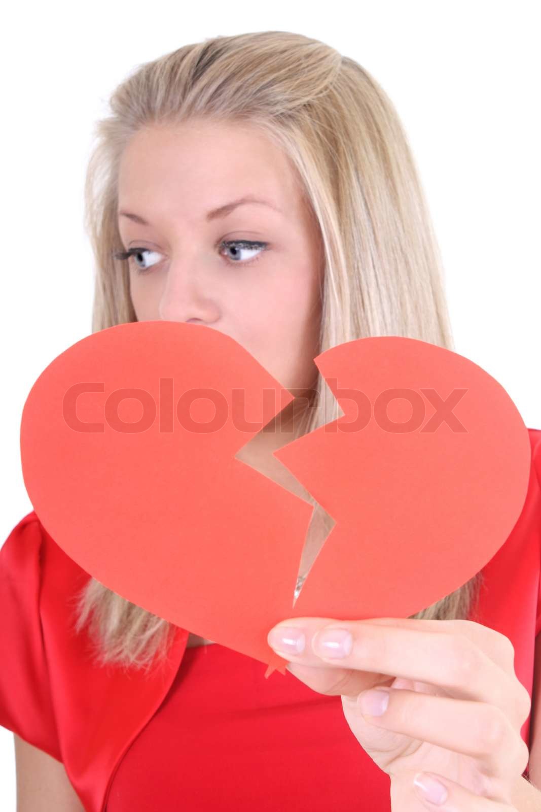 Sad kvinde med knust hjerte | Stock foto | Colourbox