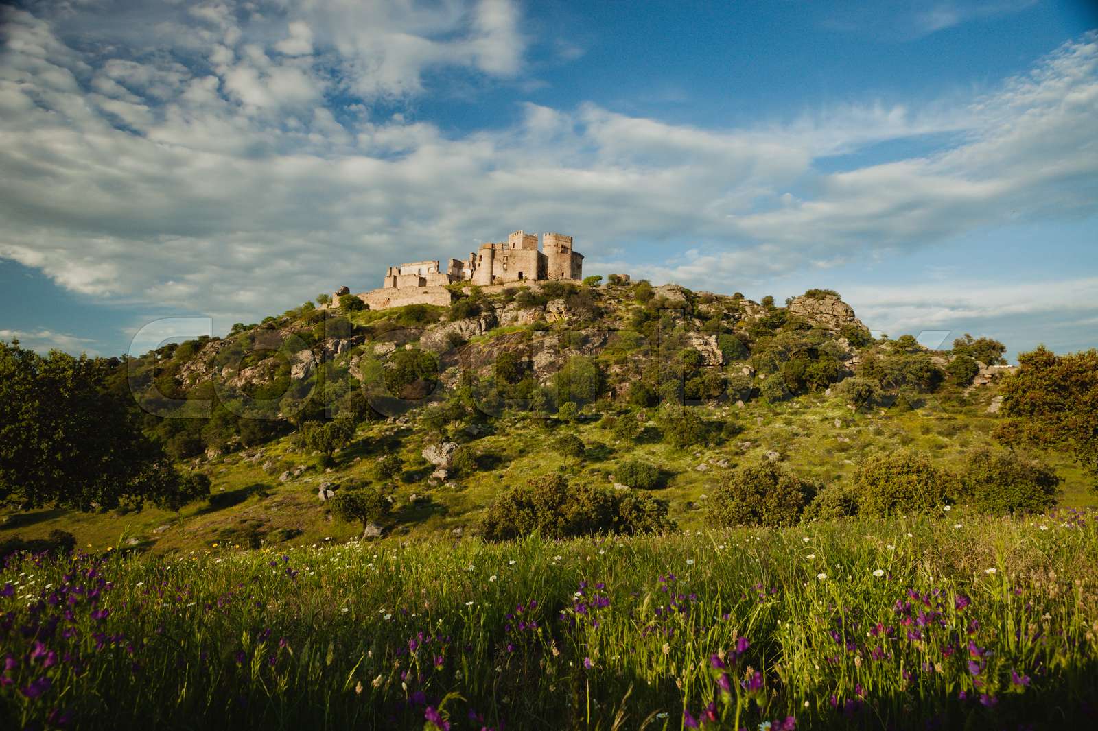 Beautiful Spanish old castle over a hill and a beautiful sky | Stock ...