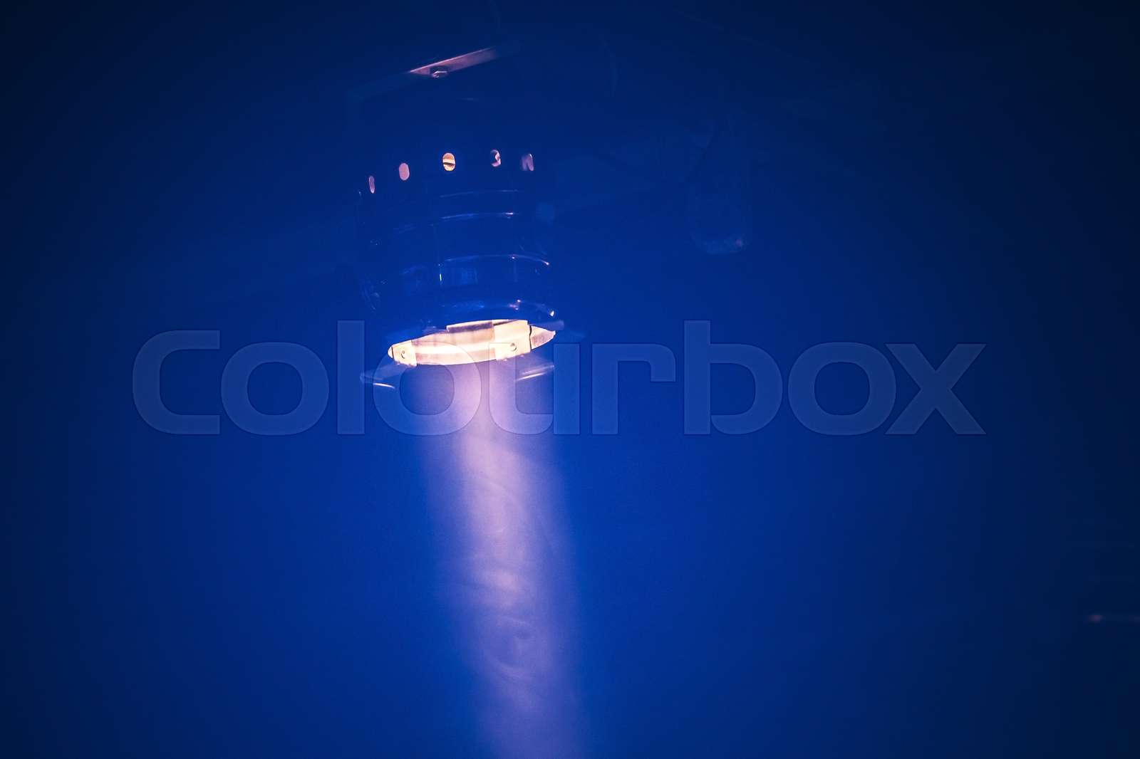 Bright scenic spot light over dark blue - Stock Image - Everypixel