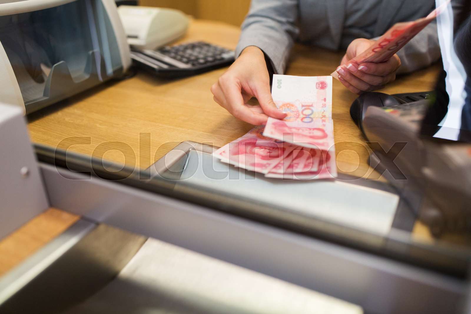 clerk counting cash money at bank office | Stock image | Colourbox