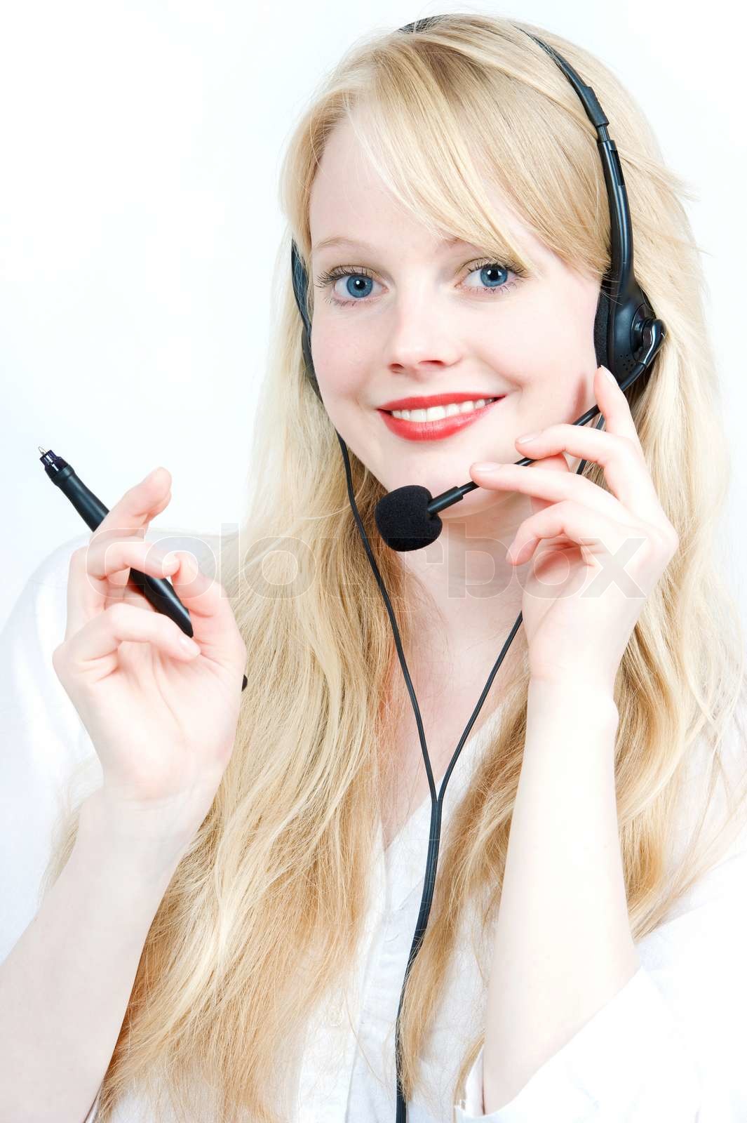 Hotline operator woman blond with headset | Stock image | Colourbox