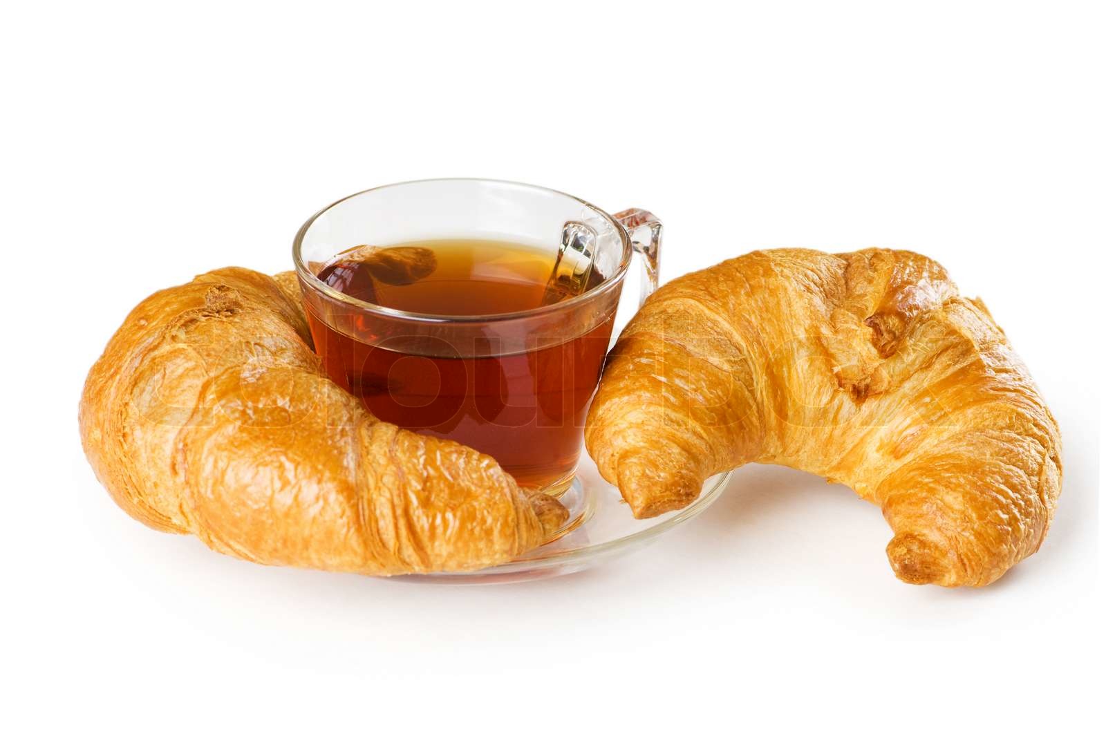 Breakfast concept - croissant and tea isolated on white | Stock image ...