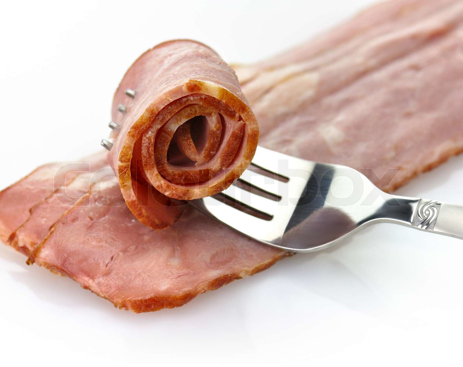 kalkun bacon med gaffel close up | Stock foto | Colourbox
