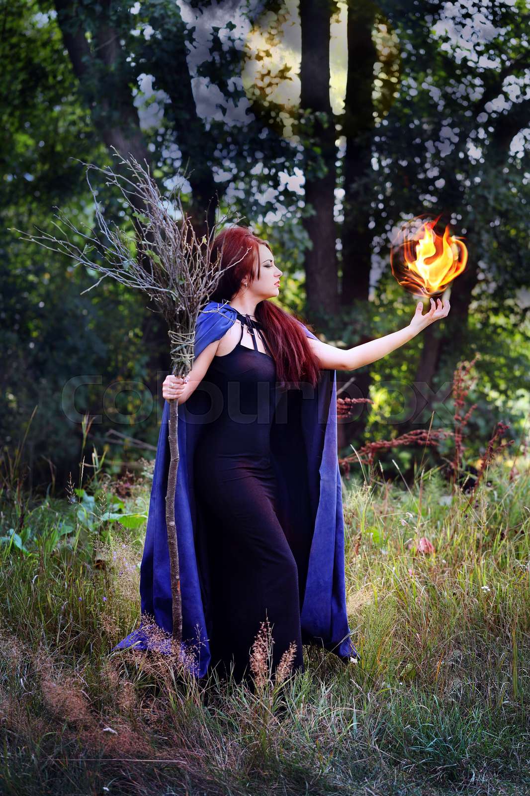witch holding a fireball | Stock image | Colourbox
