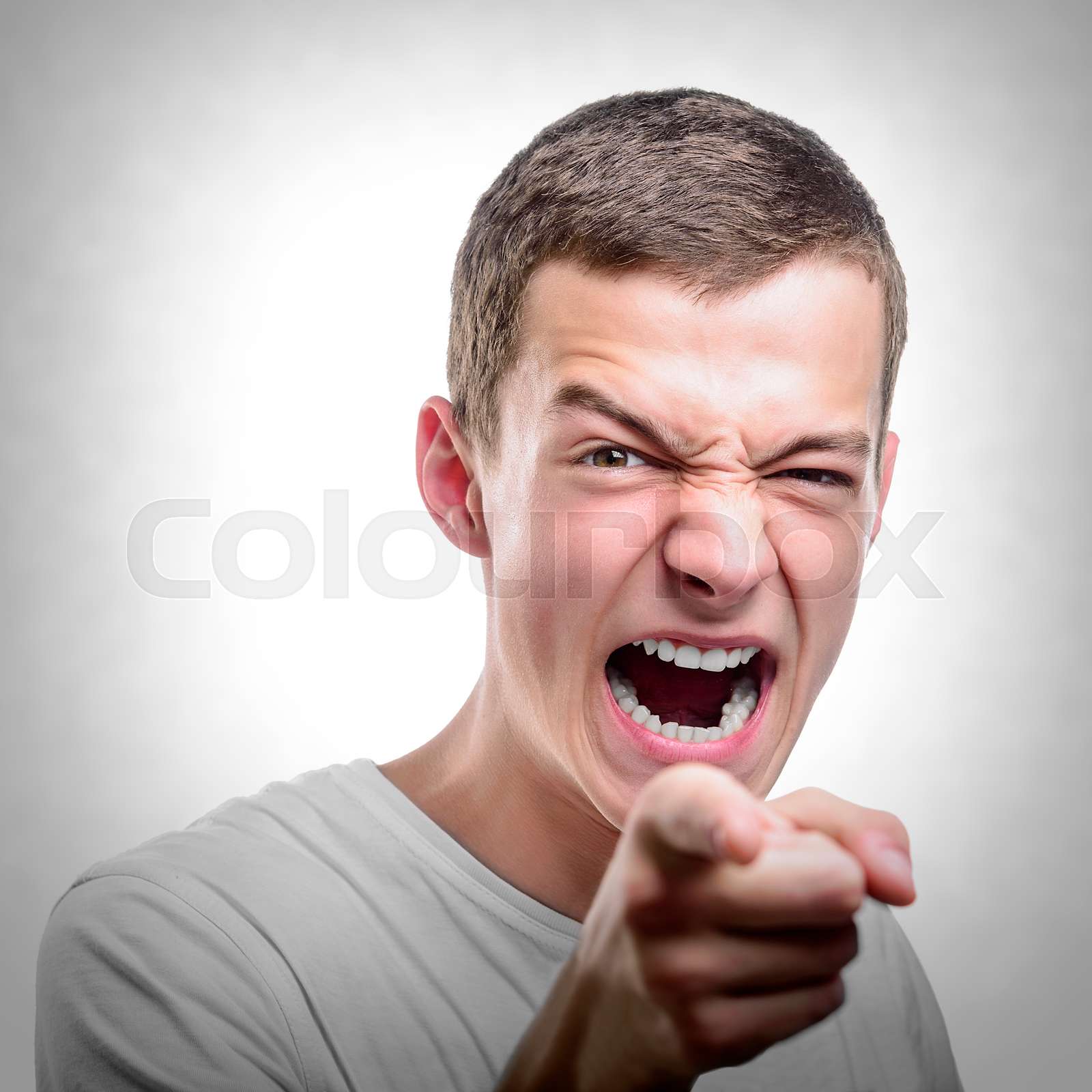 Young angry man. | Stock image | Colourbox