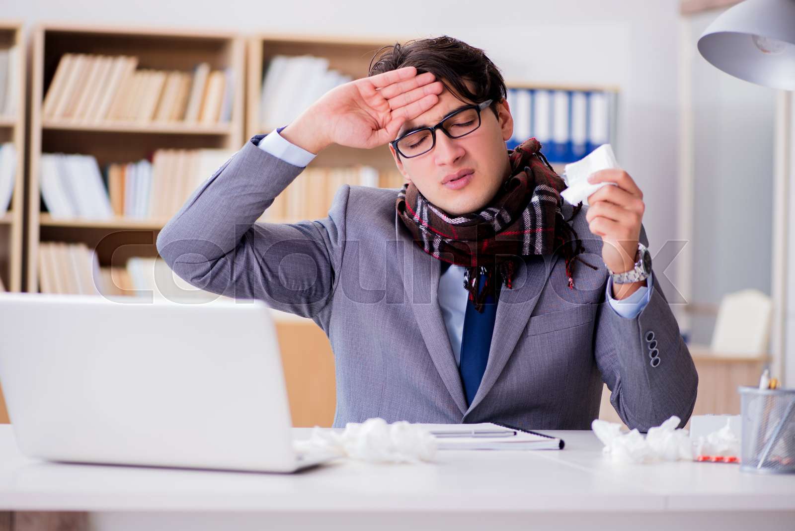 Sick businessman suffering from illness in the office | Stock image ...