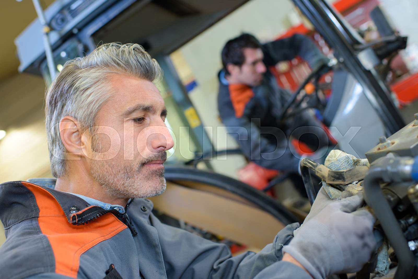 fixing a tractor | Stock image | Colourbox