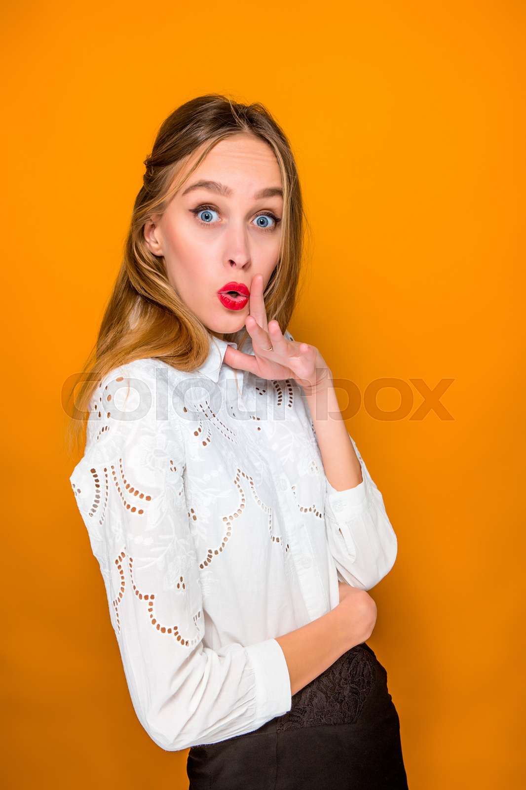 Portrait of young woman with shocked facial expression | Stock image ...