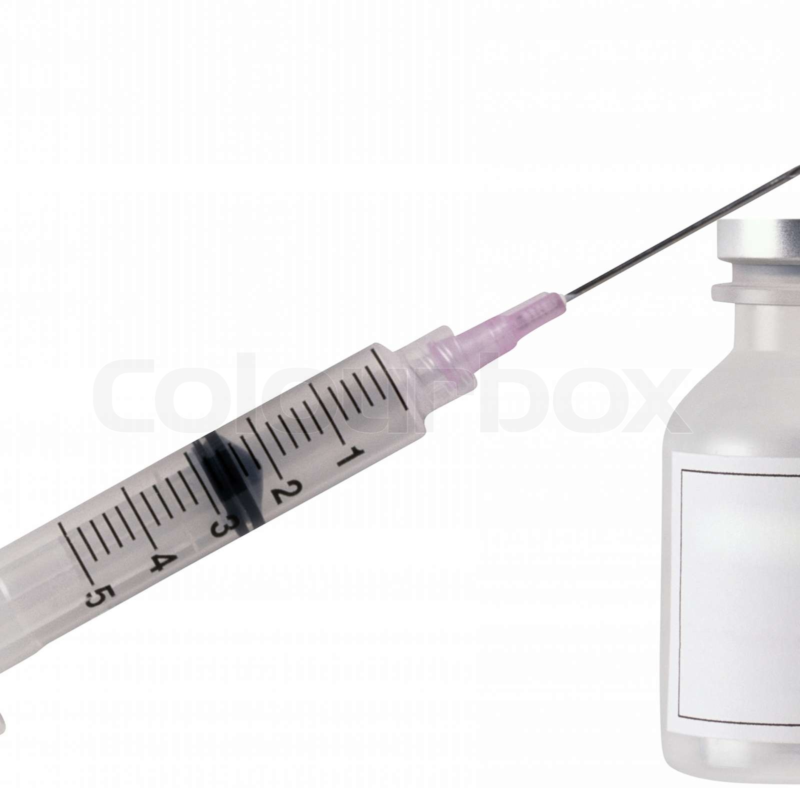Syringe and glass bottle isolated on white | Stock image | Colourbox