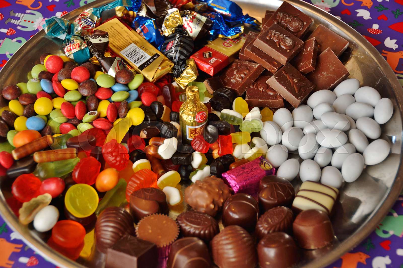 slikfade med mange slags slik | Stock foto | Colourbox