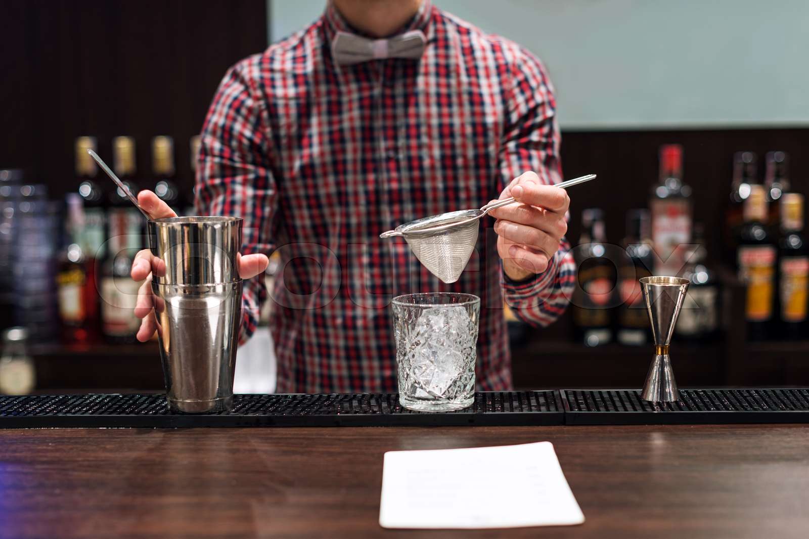 Barman show. Bartender is making cocktail at night club. | Stock image ...