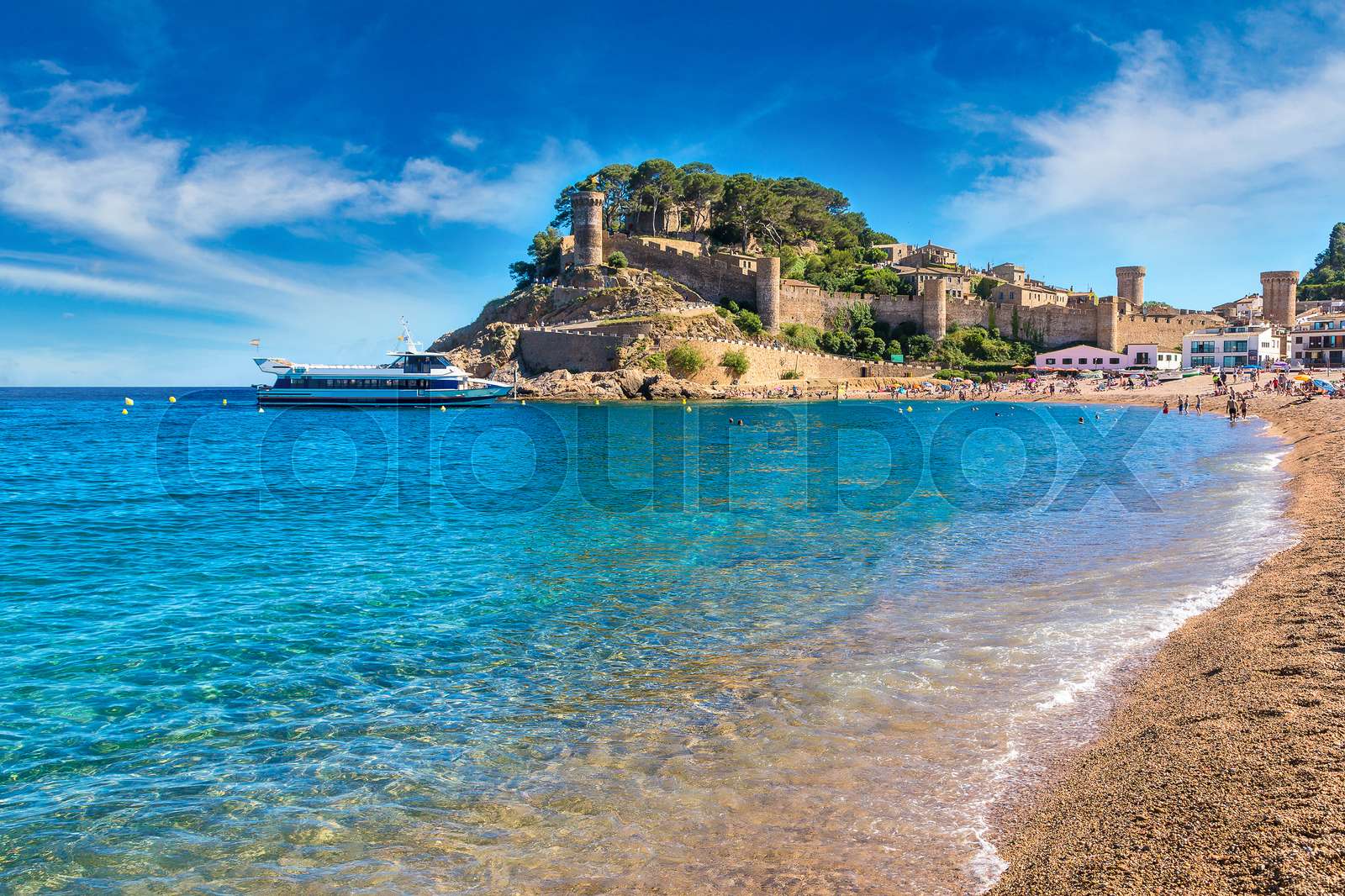 Beach at Tossa de Mar and fortress | Stock image | Colourbox