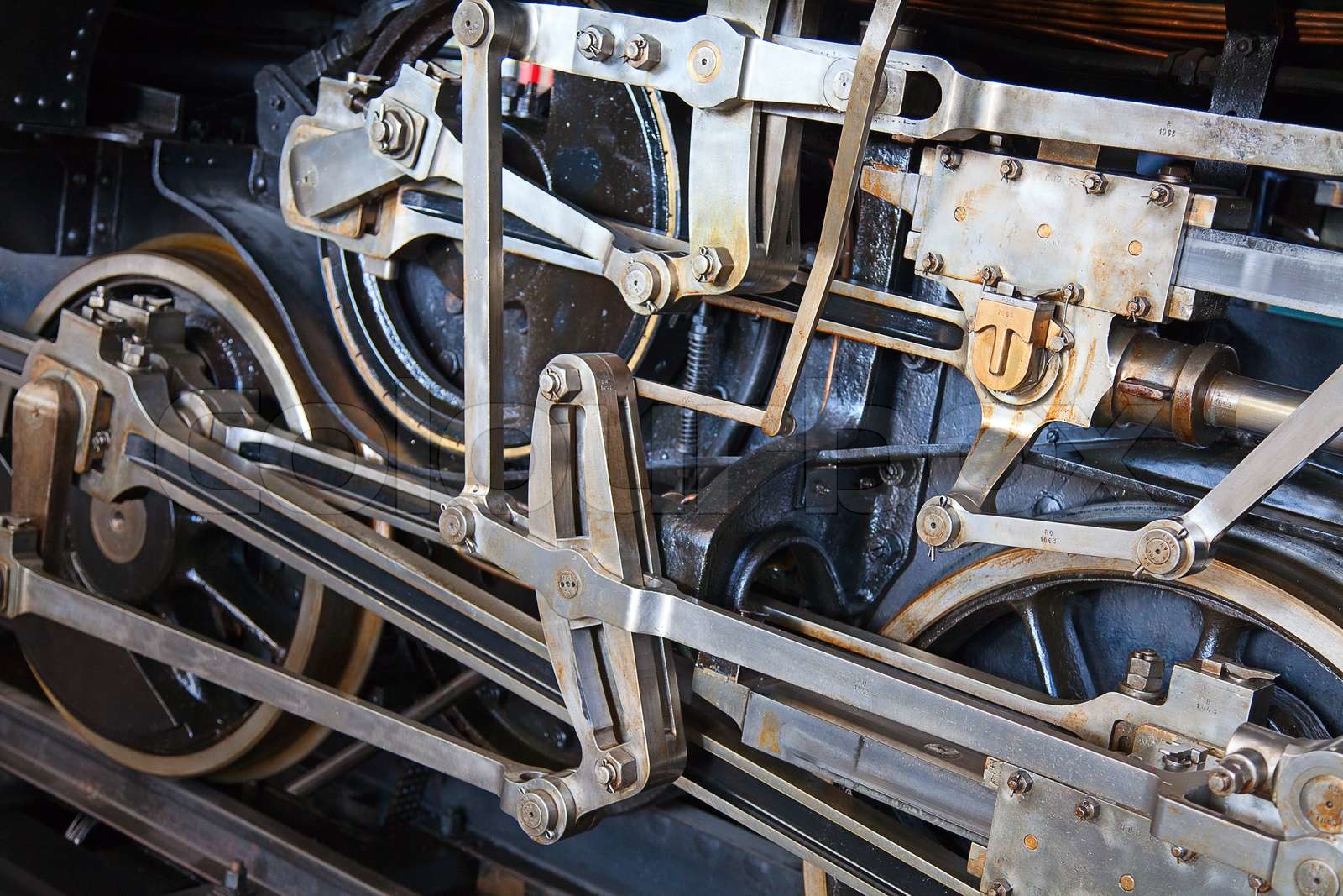 Details of the steam engine train wheels | Stock image | Colourbox