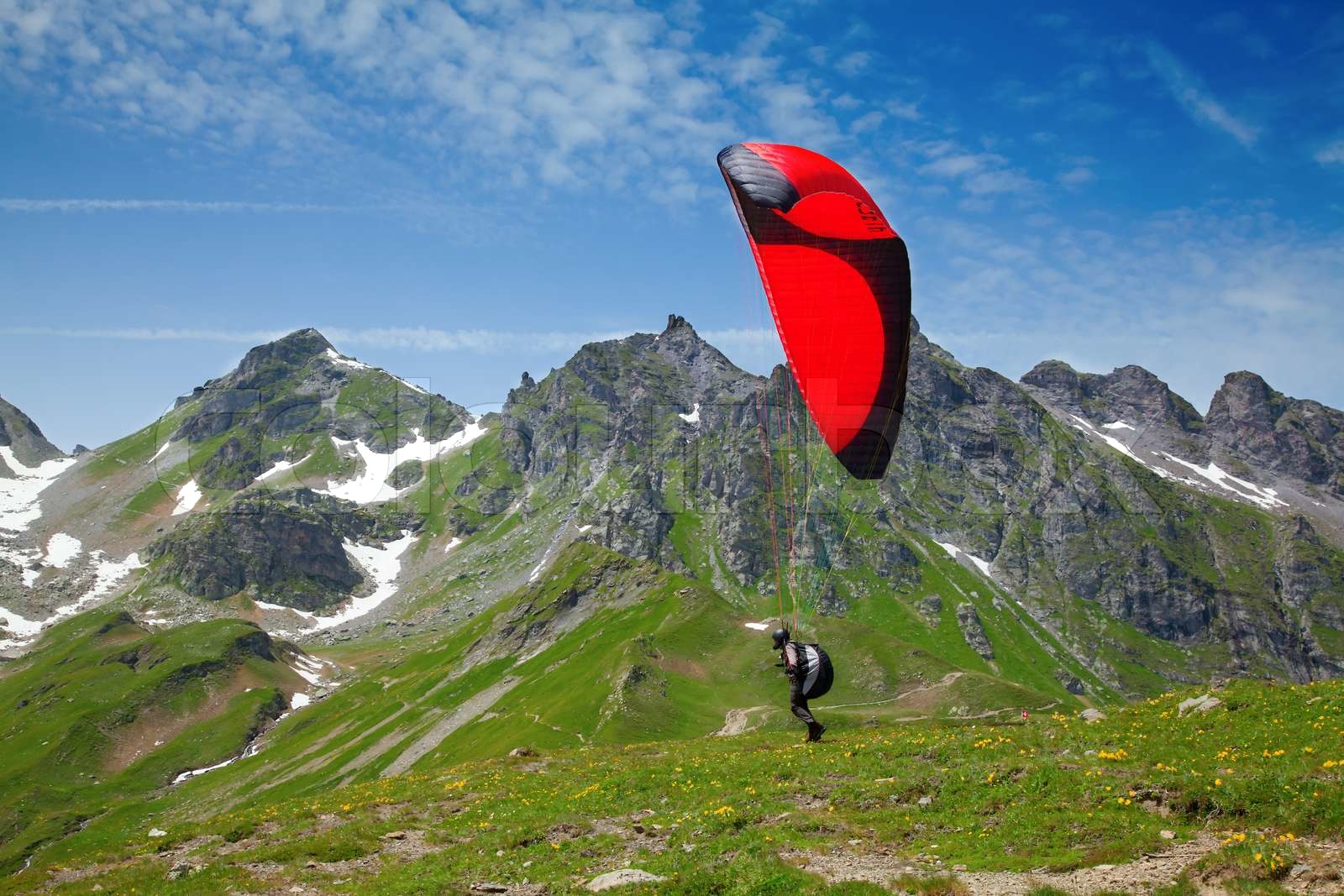 Paragliding in swiss alps near Pizol, Switzerland | Stock image | Colourbox