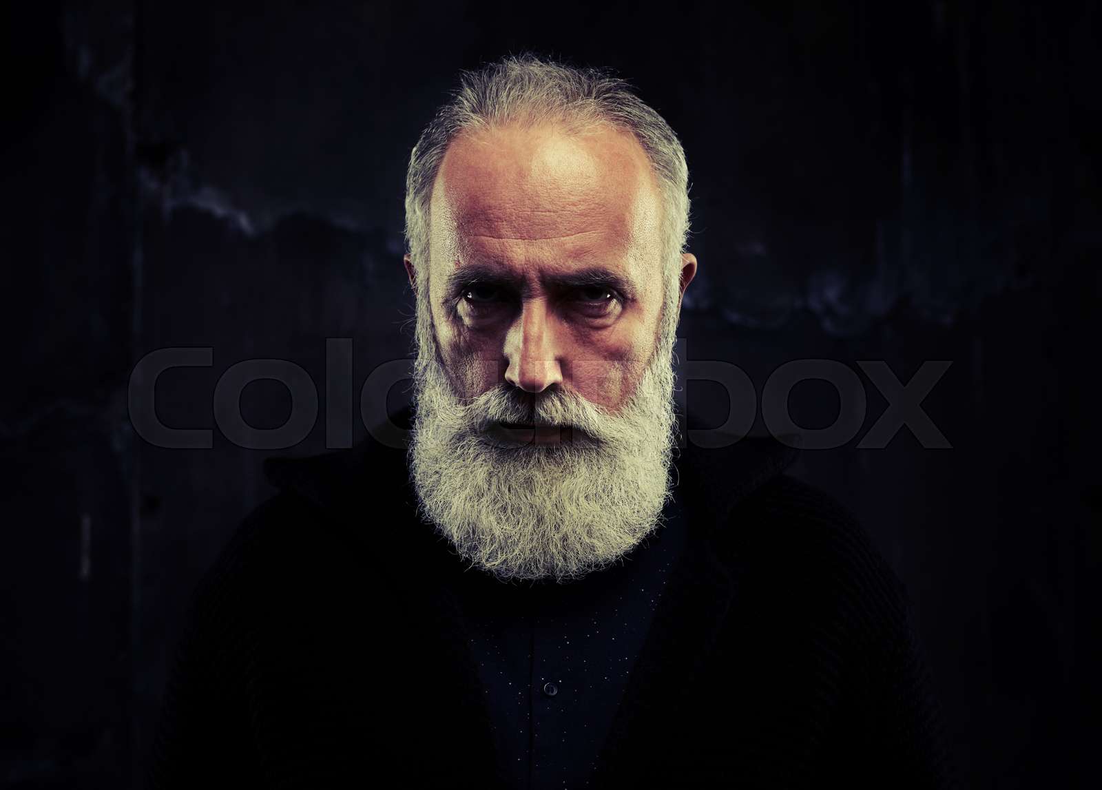 Male having a grim expression | Stock image | Colourbox