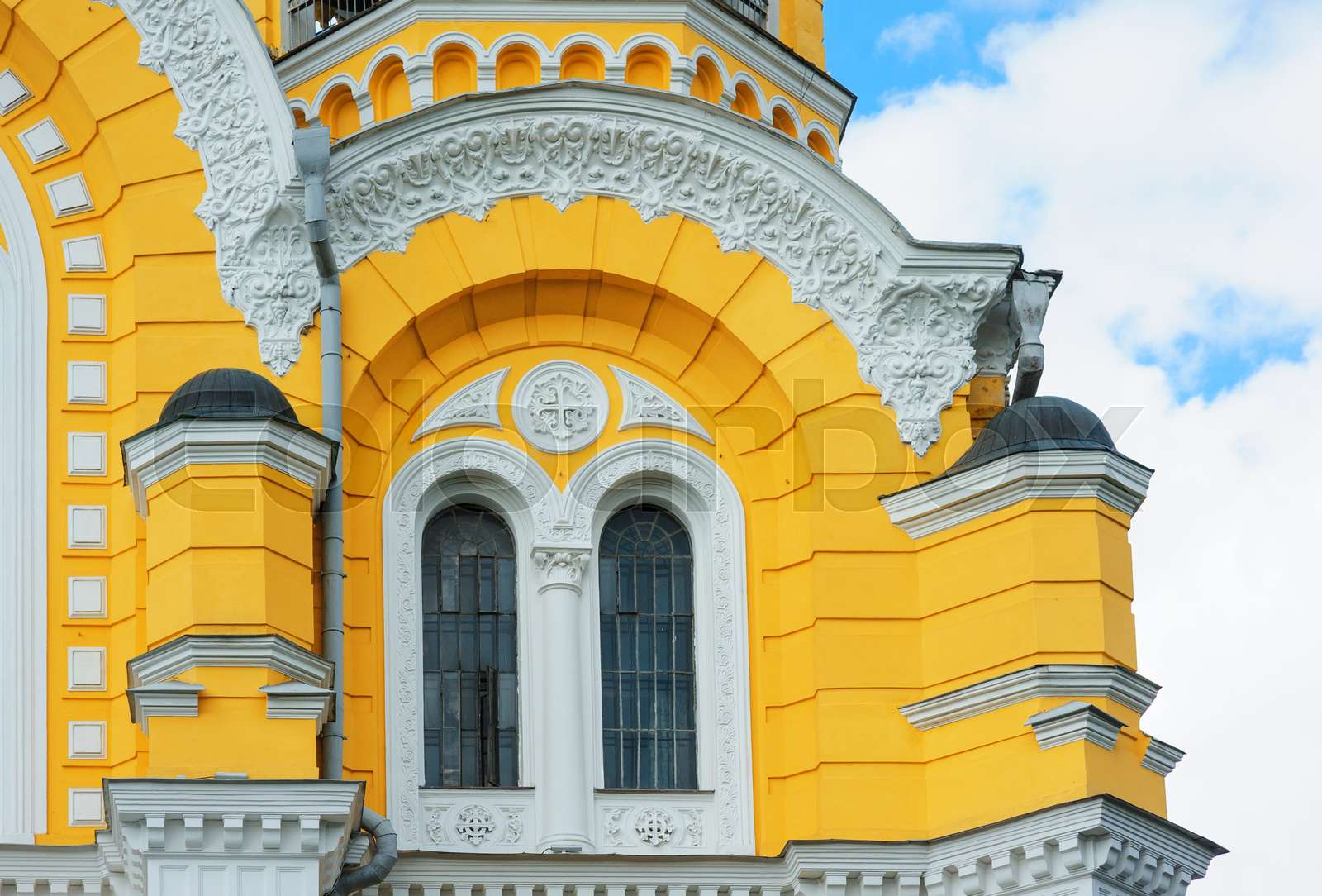 yellow church building with windows and pillars | Stock image | Colourbox