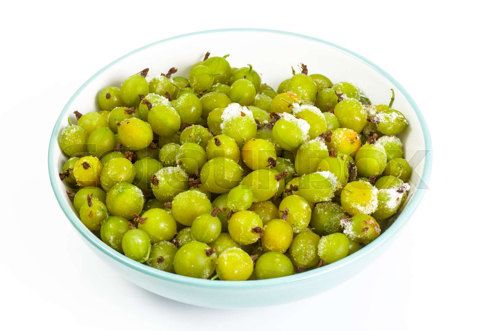 Frozen gooseberries on white | Stock image | Colourbox