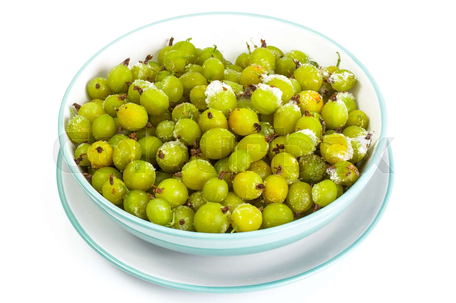 Frozen gooseberries on white | Stock image | Colourbox