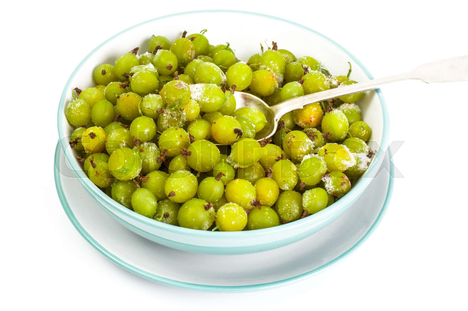 Frozen gooseberries on white | Stock image | Colourbox